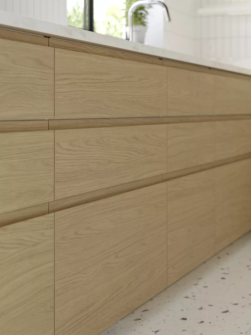 IKEA Mallorca - An oak effect kitchen with storage all around